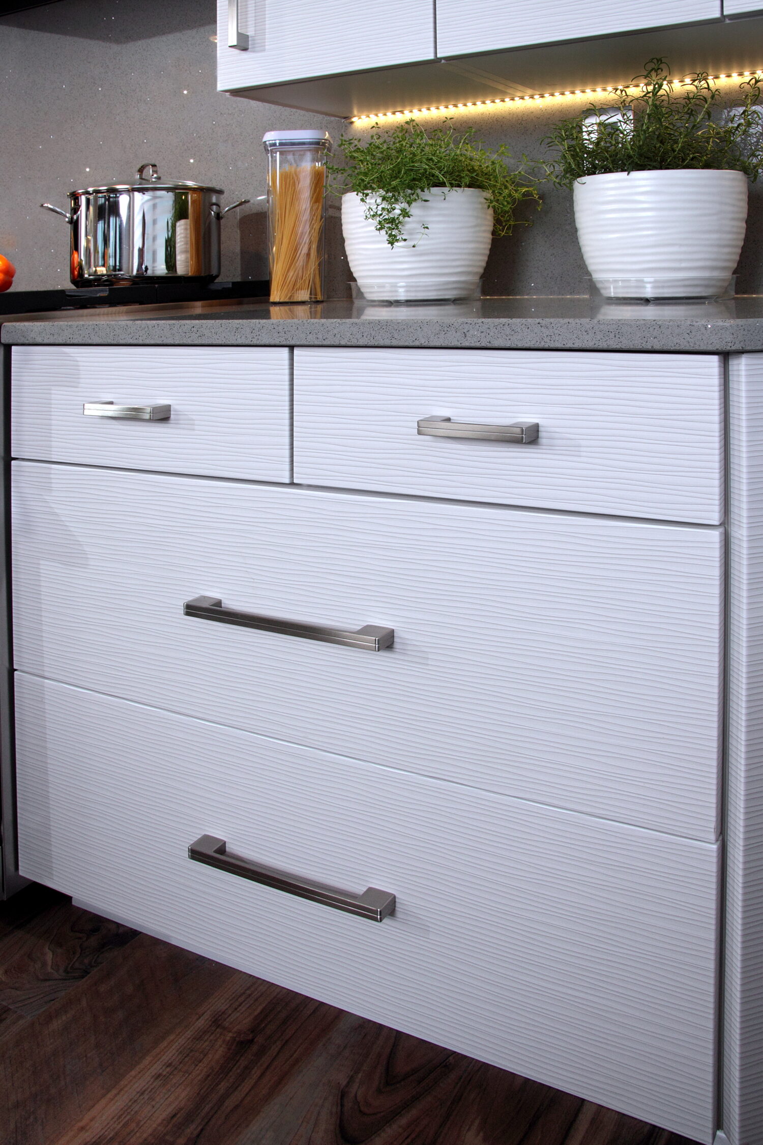 Seductive White Texture in a Modern Waterfront Kitchen - Dura Supreme ...