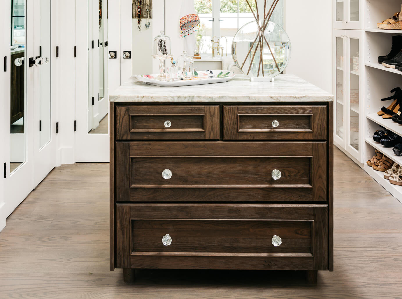 A Walk-In Closet Island Packed with Storage - Dura Supreme Cabinetry