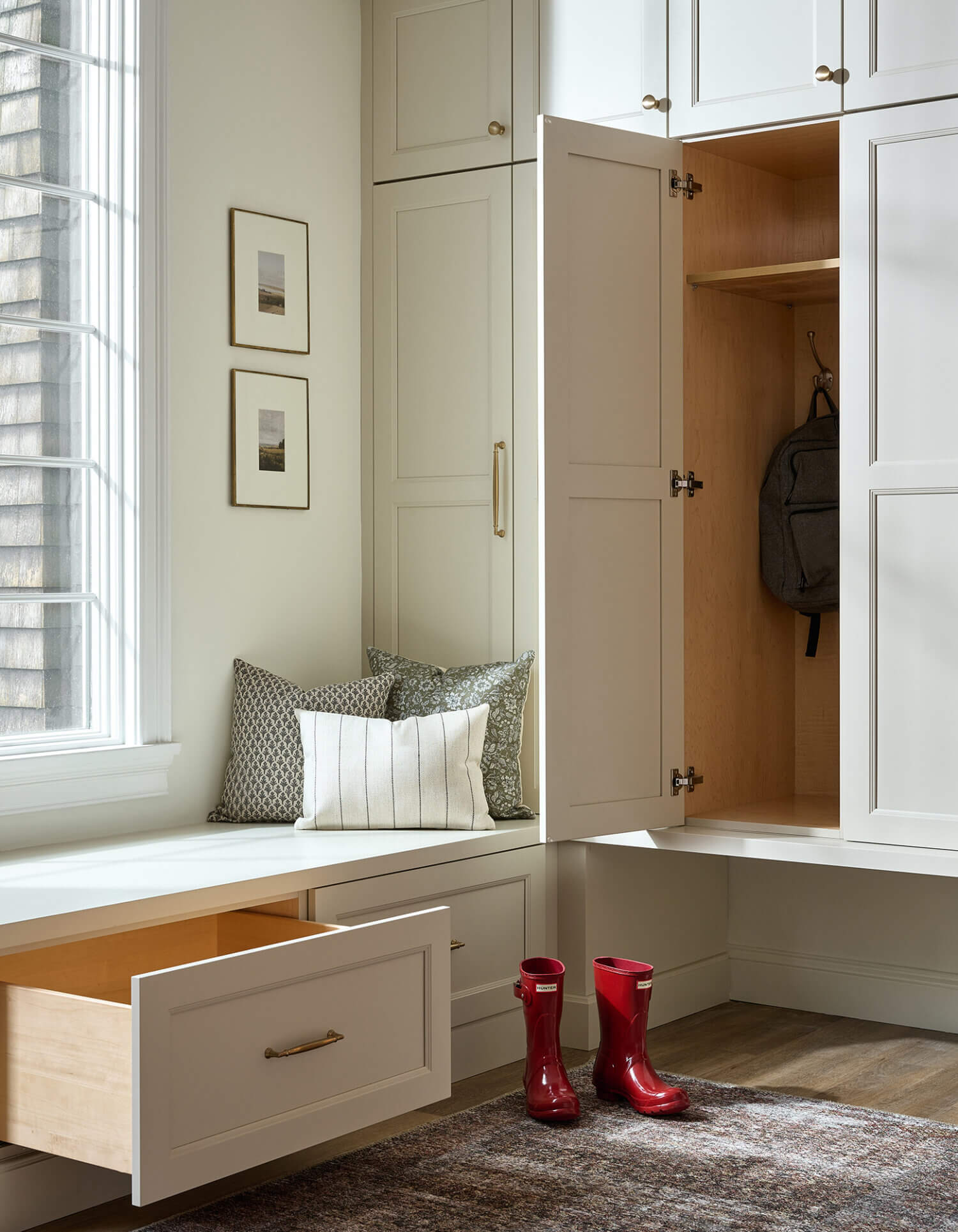 An Entry Way Corner Transformed Into a Mudroom - Dura Supreme Cabinetry