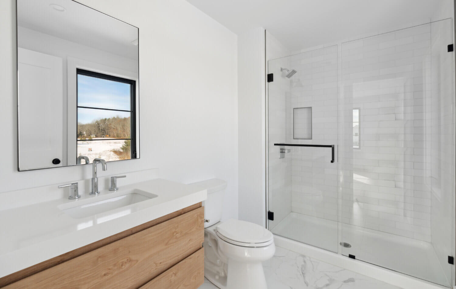 Two Bathrooms with Matching Modern Farmhouse Floating Vanities - Dura ...